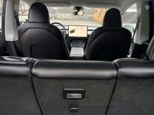 Black Tesla Model Y 2022 in Siauliai, with an engine capacity of 0.00 L and mileage of 58 thousand km for 28900 €, photo 15 on AUTOMOTO.COM.LV