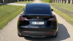 Black Tesla Model Y 2022 in Jonava, with an engine capacity of 0.00 L and mileage of 128 thousand km for 21800 €, photo 11 on AUTOMOTO.COM.LV