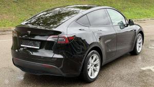 Black Tesla Model Y 2022 in Jonava, with an engine capacity of 0.00 L and mileage of 128 thousand km for 19750 €, photo 8 on AUTOMOTO.COM.LV