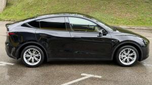 Black Tesla Model Y 2022 in Jonava, with an engine capacity of 0.00 L and mileage of 128 thousand km for 19750 €, photo 9 on AUTOMOTO.COM.LV