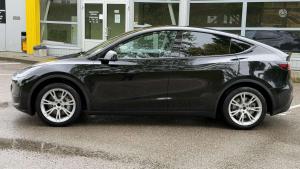 Black Tesla Model Y 2022 in Jonava, with an engine capacity of 0.00 L and mileage of 128 thousand km for 19750 €, photo 13 on AUTOMOTO.COM.LV