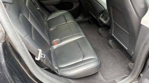 Black Tesla Model Y 2022 in Jonava, with an engine capacity of 0.00 L and mileage of 128 thousand km for 19750 €, photo 19 on AUTOMOTO.COM.LV