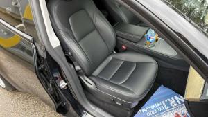 Black Tesla Model Y 2022 in Jonava, with an engine capacity of 0.00 L and mileage of 128 thousand km for 19750 €, photo 20 on AUTOMOTO.COM.LV