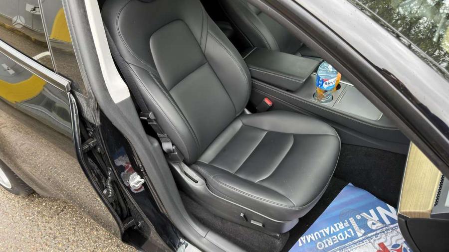 Black Tesla Model Y 2022 in Jonava, with an engine capacity of 0.00 L and mileage of 128 thousand km for 19750 €, photo 20 on AUTOMOTO.COM.LV