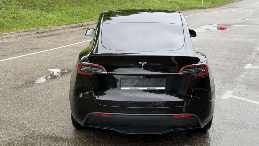 Black Tesla Model Y 2022 in Kaunas, with an engine capacity of 0.00 L and mileage of 128 thousand km for 22600 €, photo 11 on AUTOMOTO.COM.LV