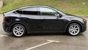 Black Tesla Model Y 2022 in Kaunas, with an engine capacity of 0.00 L and mileage of 128 thousand km for 22600 €, photo 17 on AUTOMOTO.COM.LV
