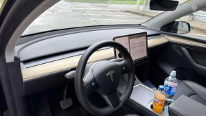 Black Tesla Model Y 2022 in Kaunas, with an engine capacity of 0.00 L and mileage of 128 thousand km for 22600 €, photo 22 on AUTOMOTO.COM.LV