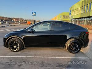 Black Tesla Model Y 2023 in Parnu, with an engine capacity of 0.00 L and mileage of 30 thousand km for 34990 €, photo 3 on AUTOMOTO.COM.LV