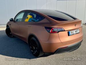 Black Tesla Model Y 2023 in Tartu, with an engine capacity of 0.00 L and mileage of 34 thousand km for 39700 €, photo 4 on AUTOMOTO.COM.LV