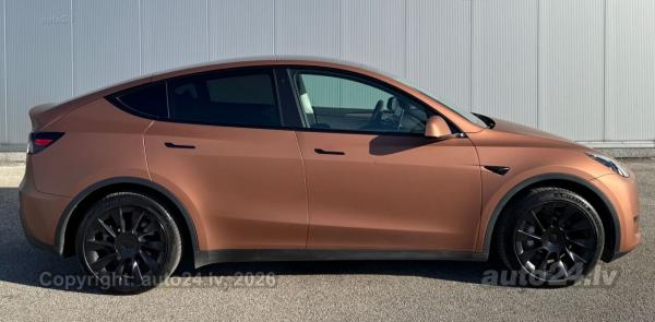 Black Tesla Model Y 2023 in Tartu, with an engine capacity of 0.00 L and mileage of 34 thousand km for 39700 €, photo 9 on AUTOMOTO.COM.LV