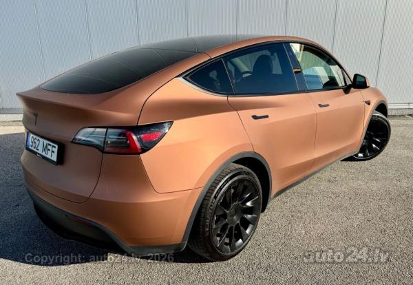 Black Tesla Model Y 2023 in Tartu, with an engine capacity of 0.00 L and mileage of 34 thousand km for 39700 €, photo 3 on AUTOMOTO.COM.LV