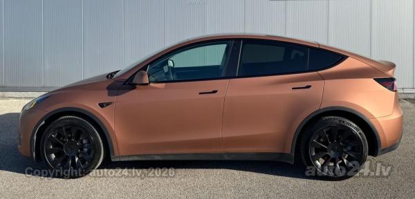 Black Tesla Model Y 2023 in Tartu, with an engine capacity of 0.00 L and mileage of 34 thousand km for 39700 €, photo 10 on AUTOMOTO.COM.LV