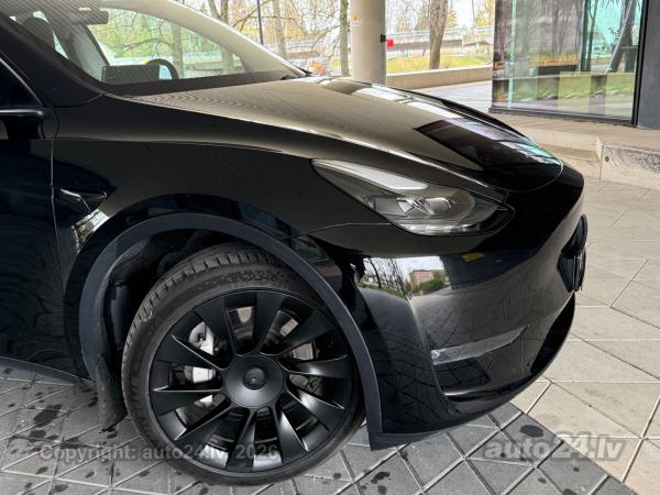 Black Tesla Model Y 2023 in Tartu, with an engine capacity of 0.00 L and mileage of 78 thousand km for 36700 €, photo 3 on AUTOMOTO.COM.LV