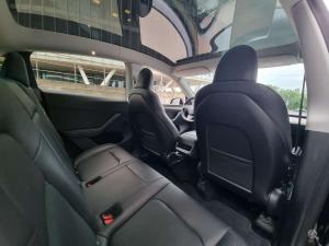 Black Tesla Model Y 2023 in Vilnius, with an engine capacity of 0.00 L and mileage of 77 thousand km for 37700 €, photo 13 on AUTOMOTO.COM.LV