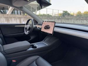 Black Tesla Model Y 2023 in Vilnius, with an engine capacity of 0.00 L and mileage of 77 thousand km for 37700 €, photo 14 on AUTOMOTO.COM.LV