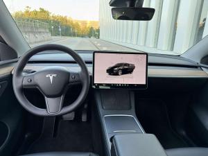 Black Tesla Model Y 2023 in Vilnius, with an engine capacity of 0.00 L and mileage of 77 thousand km for 37700 €, photo 15 on AUTOMOTO.COM.LV