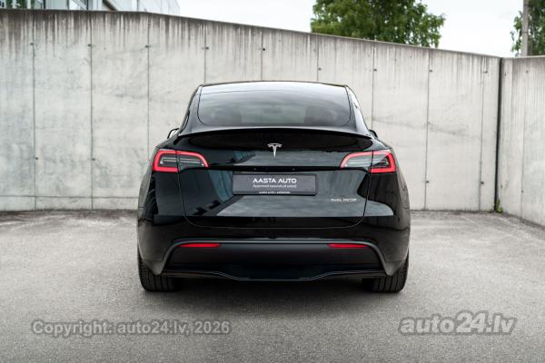Black Tesla Model Y 2023 in Tartu, with an engine capacity of 0.00 L and mileage of 54 thousand km for 39900 €, photo 6 on AUTOMOTO.COM.LV