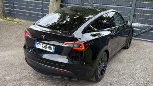 Black Tesla Model Y 2023 in Jonava, with an engine capacity of 0.00 L and mileage of 130 thousand km for 22750 €, photo 6 on AUTOMOTO.COM.LV