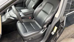 Black Tesla Model Y 2023 in Jonava, with an engine capacity of 0.00 L and mileage of 130 thousand km for 22750 €, photo 18 on AUTOMOTO.COM.LV
