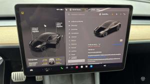 Black Tesla Model Y 2023 in Jonava, with an engine capacity of 0.00 L and mileage of 130 thousand km for 22750 €, photo 23 on AUTOMOTO.COM.LV