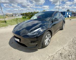 Black Tesla Model Y 2023 in Siauliai, with an engine capacity of 0.00 L and mileage of 92 thousand km for 28400 €, photo 8 on AUTOMOTO.COM.LV