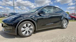 Black Tesla Model Y 2023 in Siauliai, with an engine capacity of 0.00 L and mileage of 92 thousand km for 28400 €, photo 9 on AUTOMOTO.COM.LV