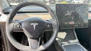 Black Tesla Model Y 2023 in Siauliai, with an engine capacity of 0.00 L and mileage of 92 thousand km for 28400 €, photo 12 on AUTOMOTO.COM.LV