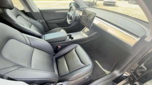 Black Tesla Model Y 2023 in Siauliai, with an engine capacity of 0.00 L and mileage of 92 thousand km for 28400 €, photo 15 on AUTOMOTO.COM.LV