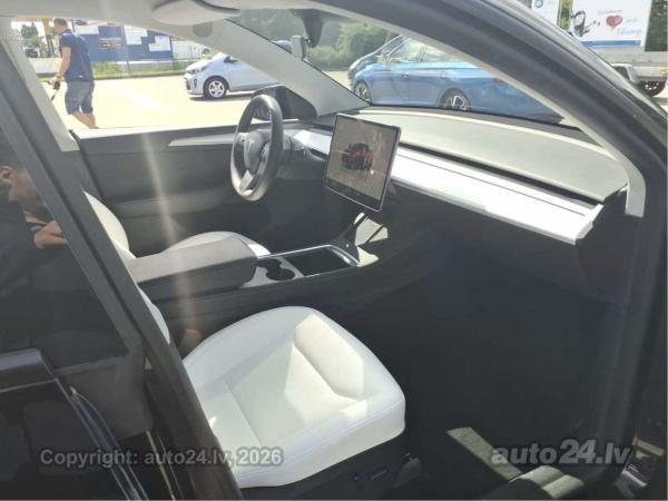Melns Tesla Model Y 2023 Tallina, ar dzinēja tilpumu 0.00 L un nobraukumu 47 tūkst. km par 40990 €, foto 5 vietnē AUTOMOTO.COM.LV