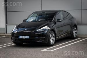 Black Tesla Model Y 2023 in Riga, with an engine capacity of 0.00 L and mileage of 36 thousand km for 36950 €, photo  on AUTOMOTO.COM.LV
