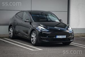 Black Tesla Model Y 2023 in Riga, with an engine capacity of 0.00 L and mileage of 36 thousand km for 36950 €, photo 4 on AUTOMOTO.COM.LV