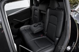 Black Tesla Model Y 2023 in Riga, with an engine capacity of 0.00 L and mileage of 36 thousand km for 36950 €, photo 14 on AUTOMOTO.COM.LV
