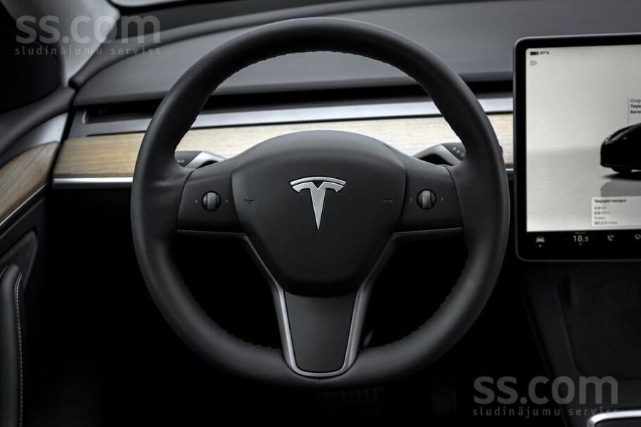 Black Tesla Model Y 2023 in Riga, with an engine capacity of 0.00 L and mileage of 36 thousand km for 36950 €, photo 20 on AUTOMOTO.COM.LV