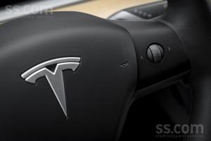 Black Tesla Model Y 2023 in Riga, with an engine capacity of 0.00 L and mileage of 36 thousand km for 36950 €, photo 21 on AUTOMOTO.COM.LV