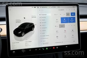 Black Tesla Model Y 2023 in Riga, with an engine capacity of 0.00 L and mileage of 36 thousand km for 36950 €, photo 23 on AUTOMOTO.COM.LV