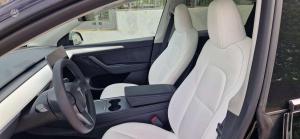 Black Tesla Model Y 2023 in Marijampole, with an engine capacity of 0.00 L and mileage of 84 thousand km for 25900 €, photo 8 on AUTOMOTO.COM.LV