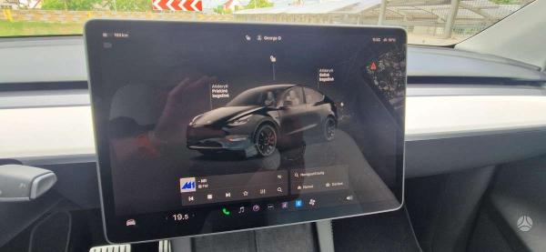Black Tesla Model Y 2023 in Marijampole, with an engine capacity of 0.00 L and mileage of 84 thousand km for 25900 €, photo 10 on AUTOMOTO.COM.LV