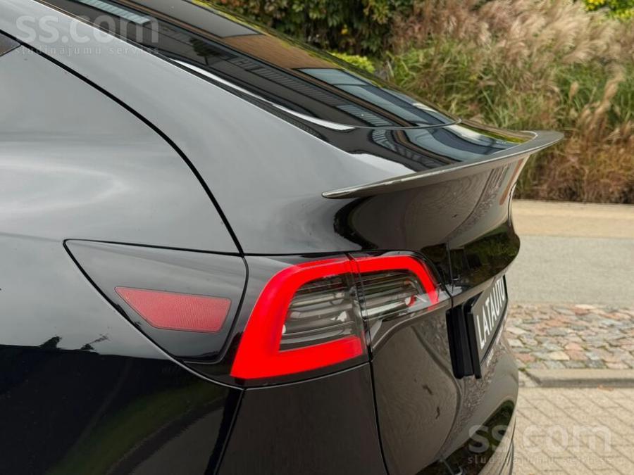 Melns Tesla Model Y 2023 Rīga, ar dzinēja tilpumu 0.00 L un nobraukumu 116 tūkst. km par 33995 €, foto 14 vietnē AUTOMOTO.COM.LV