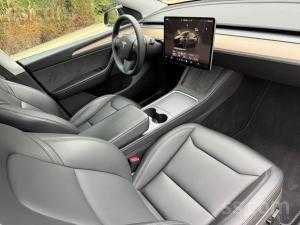 Melns Tesla Model Y 2023 Rīga, ar dzinēja tilpumu 0.00 L un nobraukumu 116 tūkst. km par 33995 €, foto 23 vietnē AUTOMOTO.COM.LV