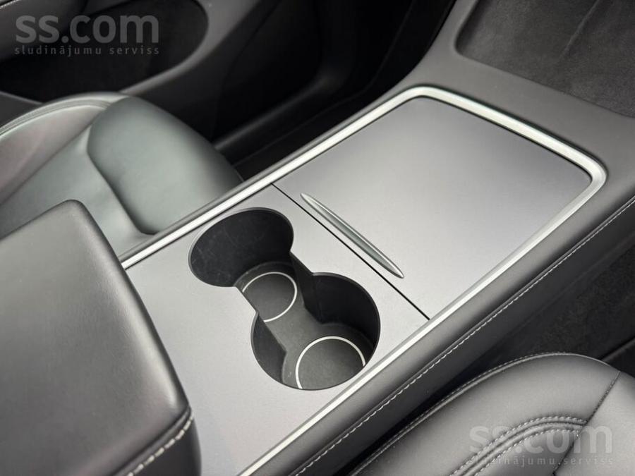Melns Tesla Model Y 2023 Rīga, ar dzinēja tilpumu 0.00 L un nobraukumu 116 tūkst. km par 33995 €, foto 26 vietnē AUTOMOTO.COM.LV