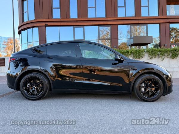 Melns Tesla Model Y 2024 Tallina, ar dzinēja tilpumu 0.00 L un nobraukumu 53 tūkst. km par 40900 €, foto 5 vietnē AUTOMOTO.COM.LV