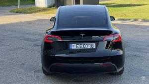 Black Tesla Model Y 2024 in Jonava, with an engine capacity of 0.00 L and mileage of 61 thousand km for 29500 €, photo 7 on AUTOMOTO.COM.LV