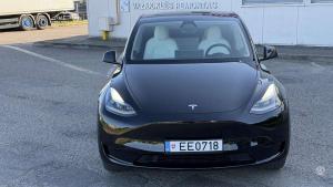 Black Tesla Model Y 2024 in Jonava, with an engine capacity of 0.00 L and mileage of 61 thousand km for 29500 €, photo 11 on AUTOMOTO.COM.LV