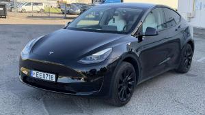 Black Tesla Model Y 2024 in Jonava, with an engine capacity of 0.00 L and mileage of 61 thousand km for 29500 €, photo 12 on AUTOMOTO.COM.LV