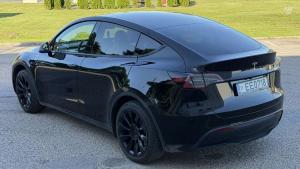 Black Tesla Model Y 2024 in Jonava, with an engine capacity of 0.00 L and mileage of 61 thousand km for 29500 €, photo 14 on AUTOMOTO.COM.LV