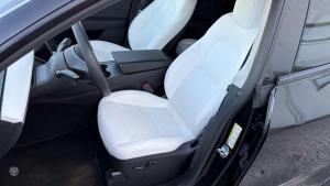 Black Tesla Model Y 2024 in Jonava, with an engine capacity of 0.00 L and mileage of 61 thousand km for 29500 €, photo 18 on AUTOMOTO.COM.LV