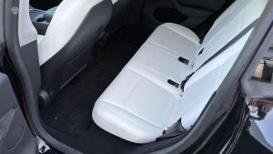 Black Tesla Model Y 2024 in Jonava, with an engine capacity of 0.00 L and mileage of 61 thousand km for 29500 €, photo 21 on AUTOMOTO.COM.LV