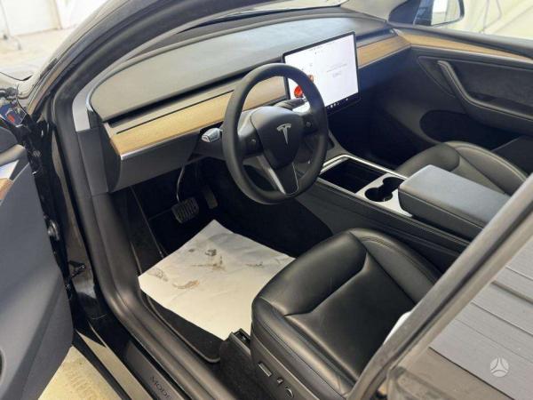 Melns Tesla Model Y 2024 Radviliškis, ar dzinēja tilpumu 0.00 L un nobraukumu 67 tūkst. km par 24744 €, foto 9 vietnē AUTOMOTO.COM.LV