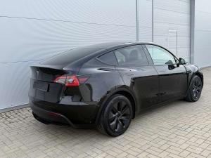 Black Tesla Model Y 2022 in Kaunas, with an engine capacity of 0.00 L and mileage of 62 thousand km for 17700 €, photo 3 on AUTOMOTO.COM.LV