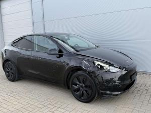 Black Tesla Model Y 2022 in Kaunas, with an engine capacity of 0.00 L and mileage of 62 thousand km for 17700 €, photo 4 on AUTOMOTO.COM.LV